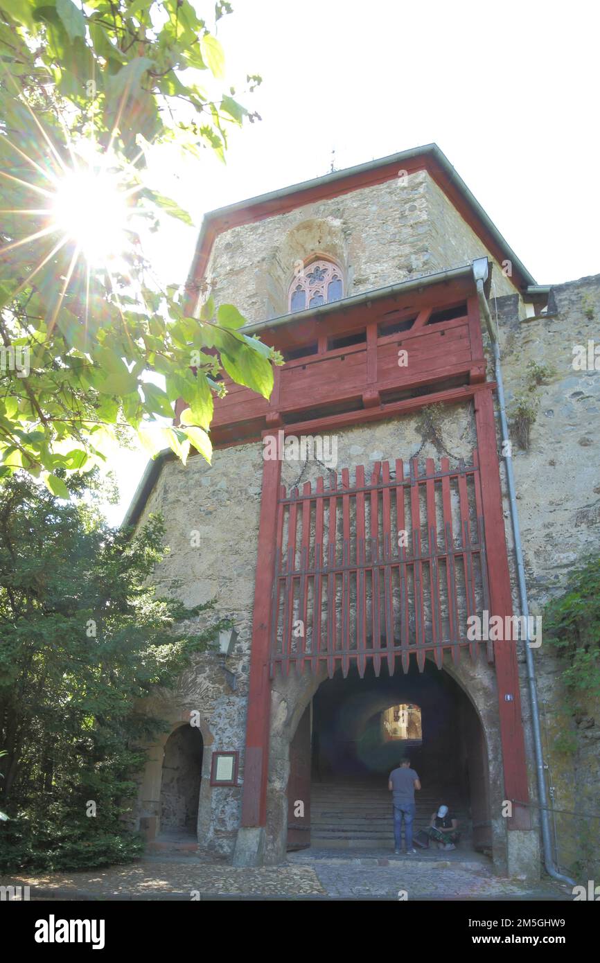 Entrance with drop gate to the castle against the light in Braunfels ...