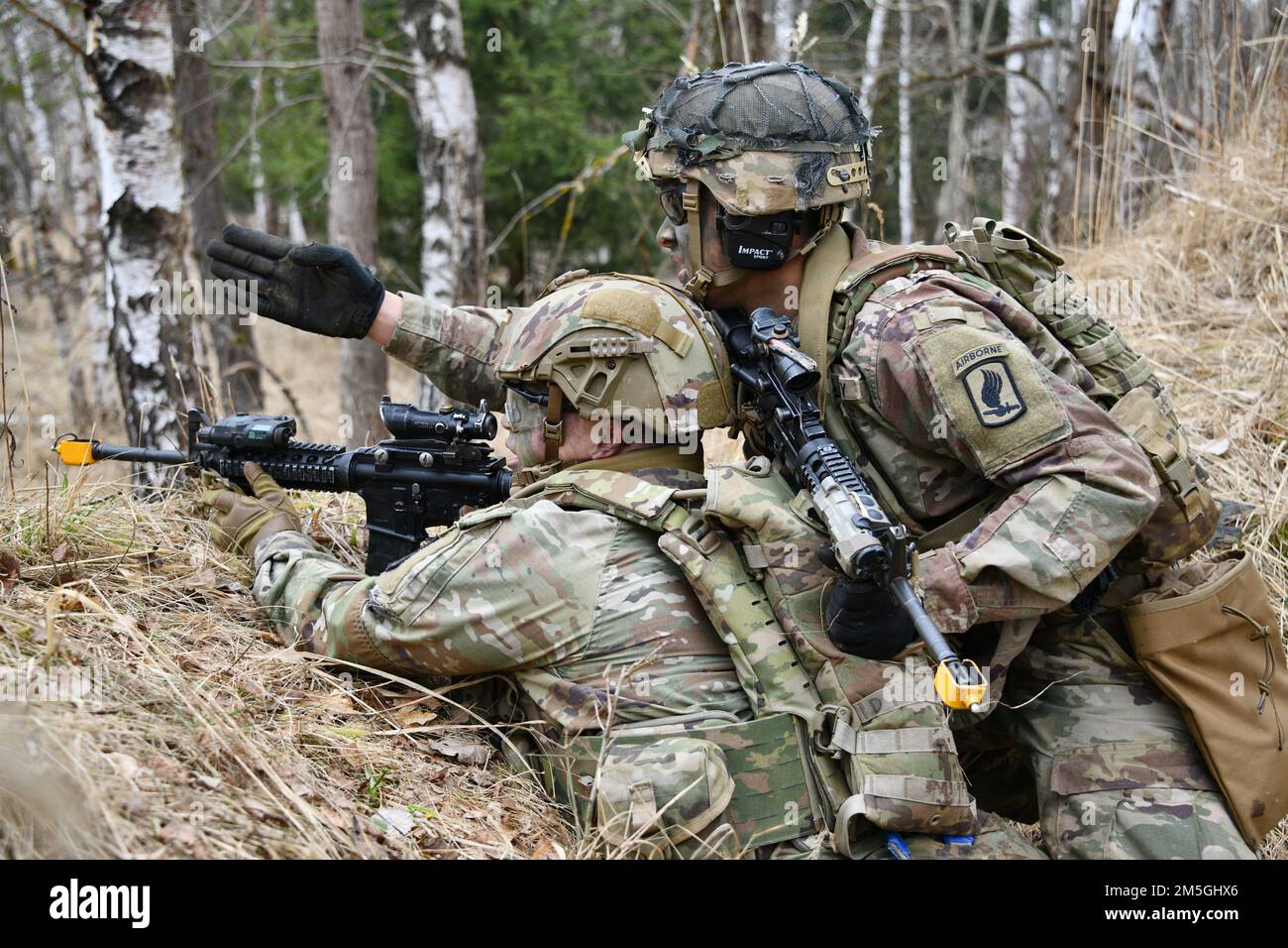 U.S. Army Staff Sgt. Estevan Sanchez, right, with Alpha Company, 1st ...
