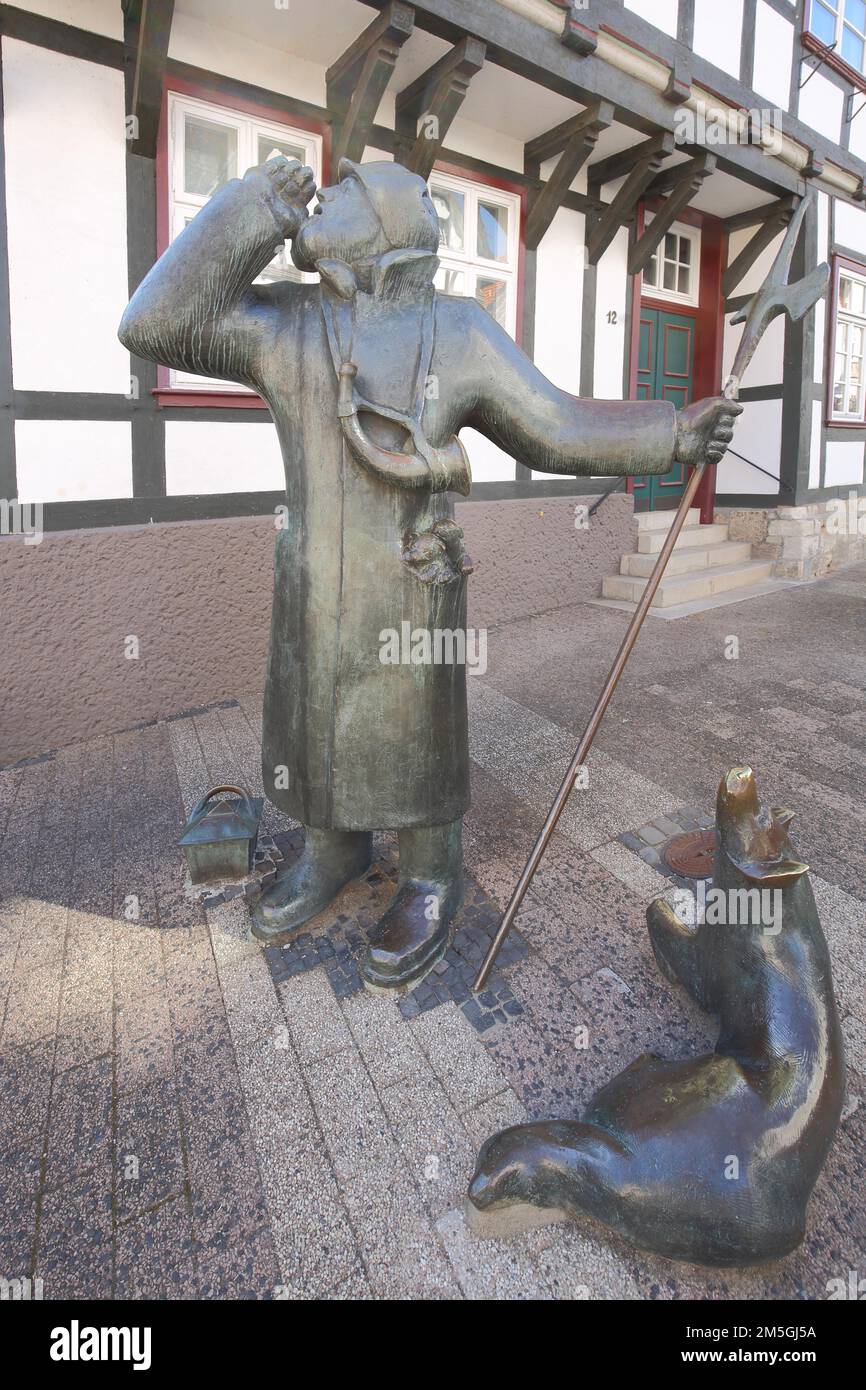 Sculpture and statue of the historic night watchman with dog and lance ...