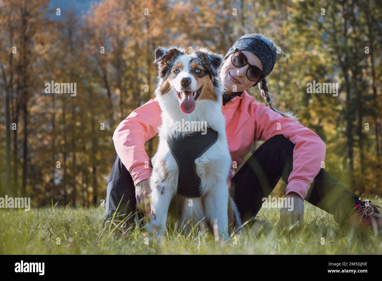 Candid portrait of a young female athlete with her running and hiking ...