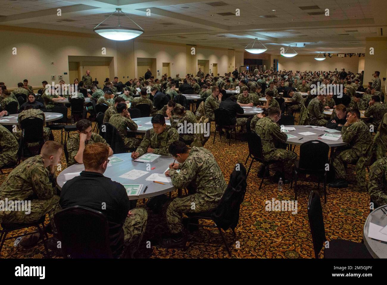 U.S. Navy Sailors take the Navy Wide Advancement Exam for E-5 ...