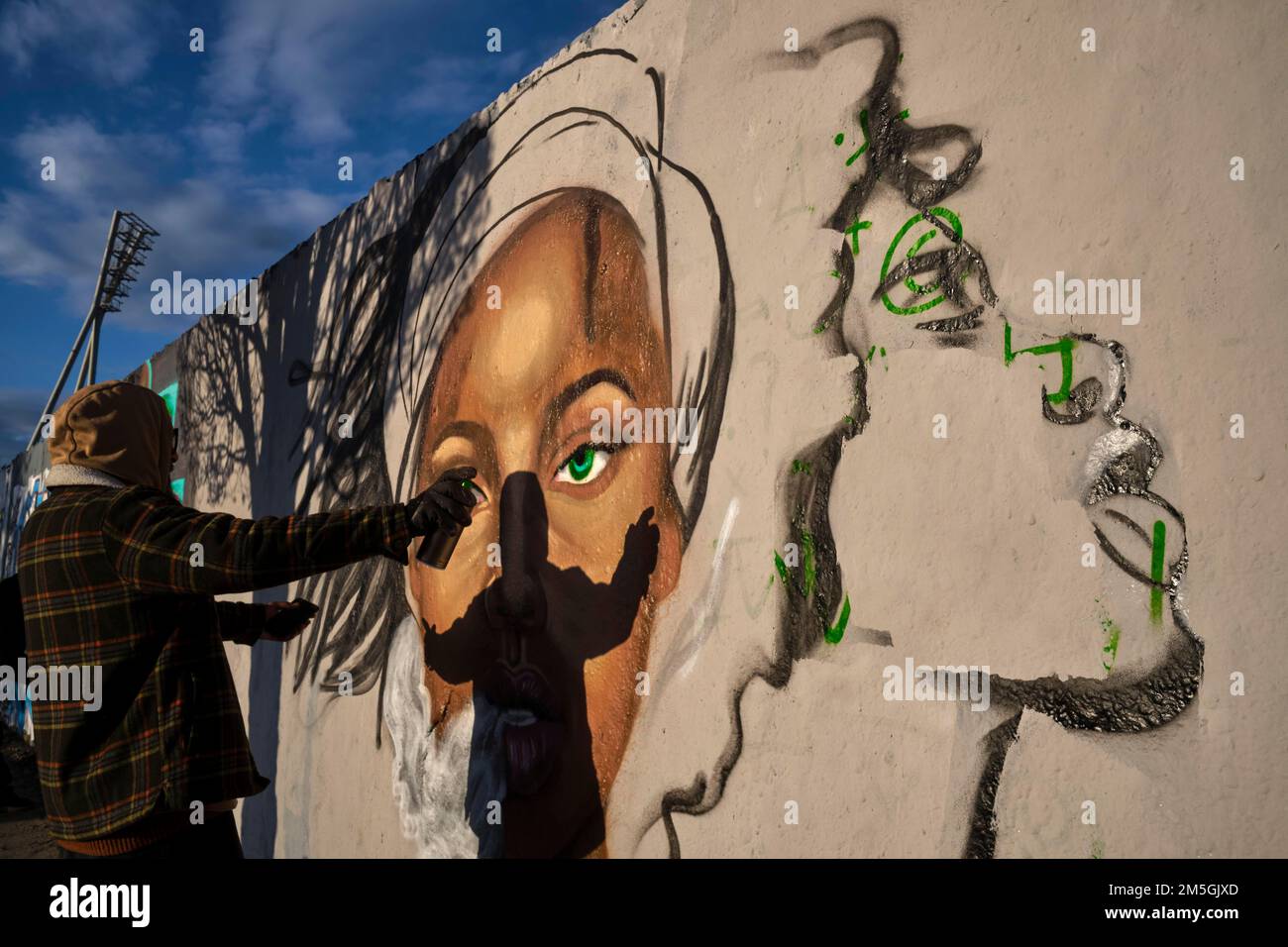 Germany, Berlin, 03. 04. 2022, Sunday afternoon in Mauerpark, graffiti ...