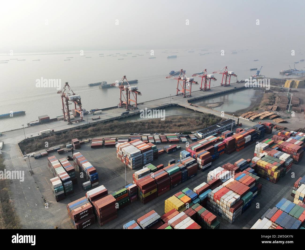 Aerial photo shows cargo ships loading and unloading containers at the ...