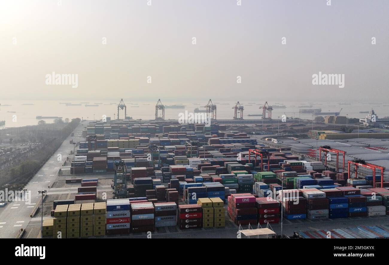 Aerial photo shows cargo ships loading and unloading containers at the ...