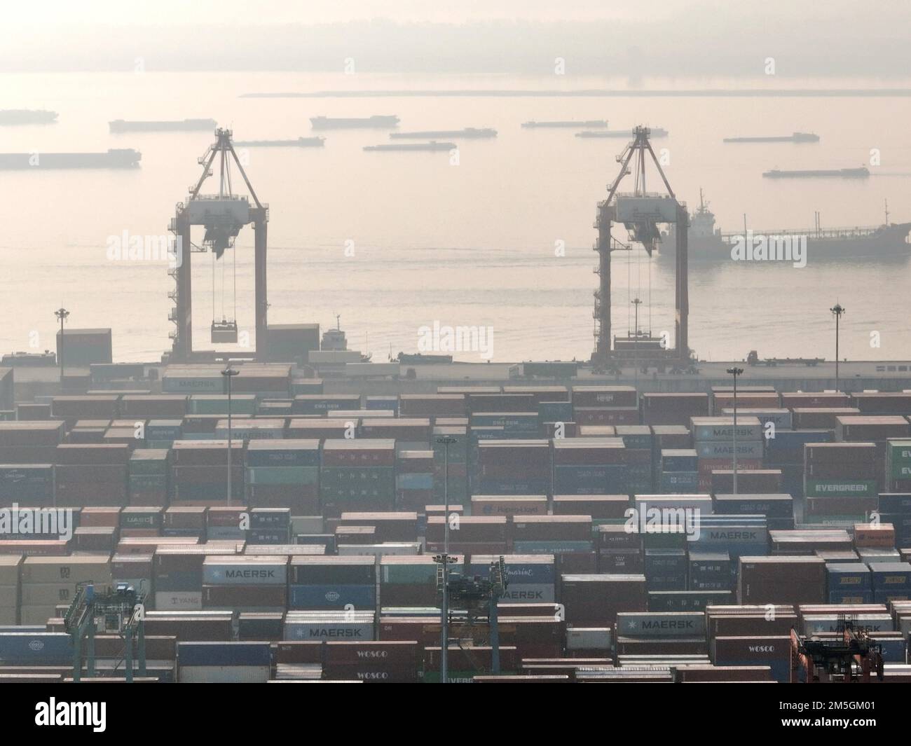 Aerial photo shows cargo ships loading and unloading containers at the ...