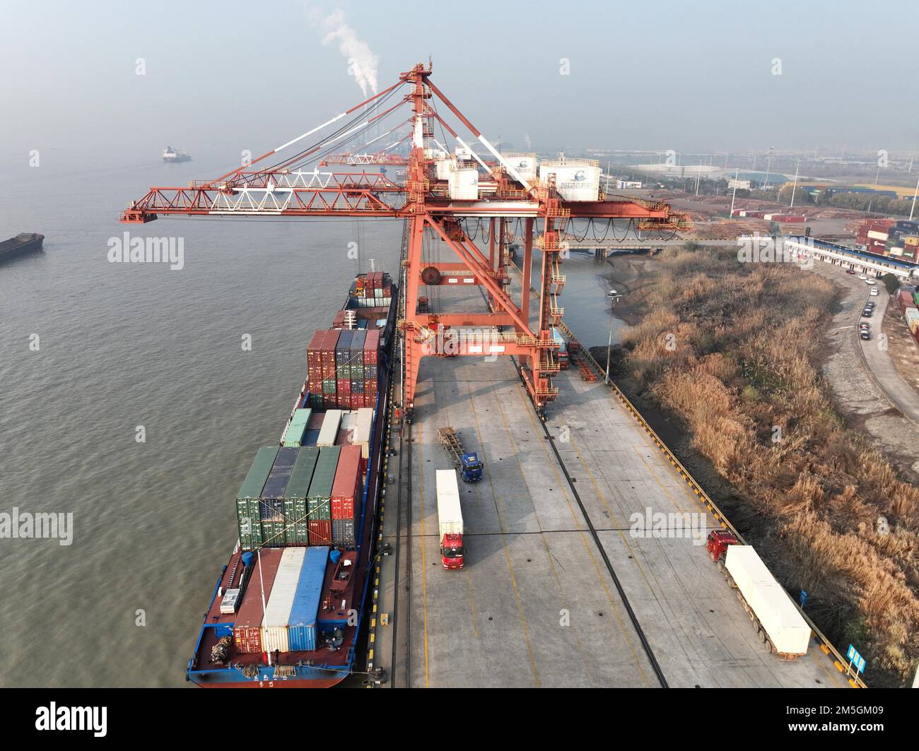 Aerial photo shows cargo ships loading and unloading containers at the ...