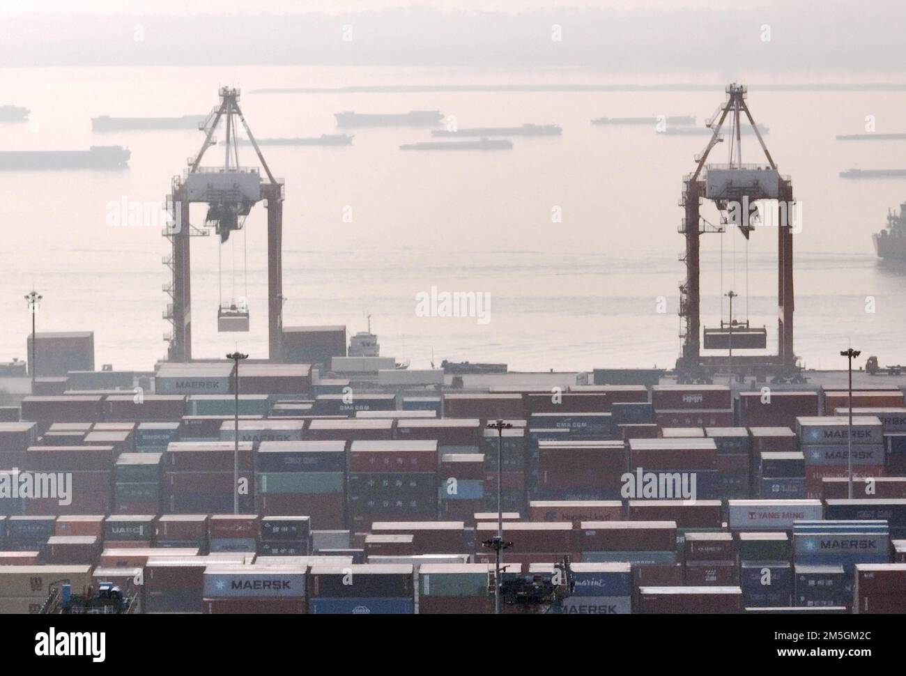 Aerial photo shows cargo ships loading and unloading containers at the ...