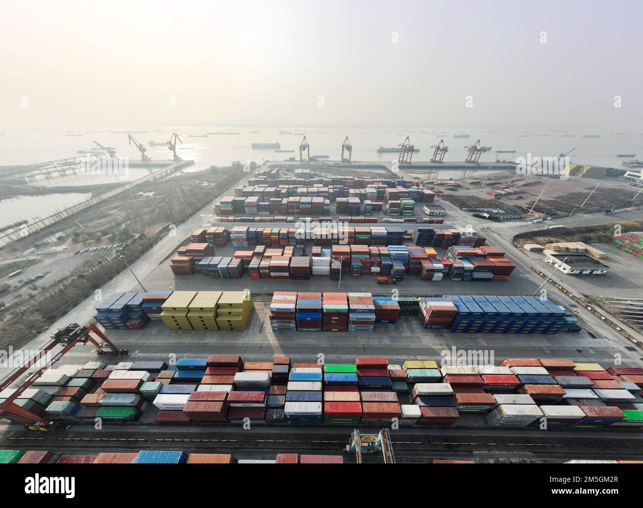Aerial photo shows cargo ships loading and unloading containers at the ...