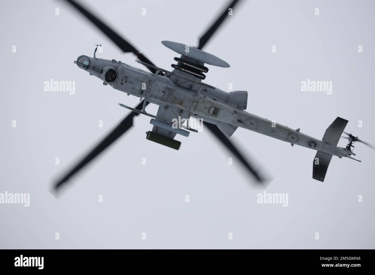 A U.S. Marine Corps AH-1Z Viper performs aerial maneuver during ...