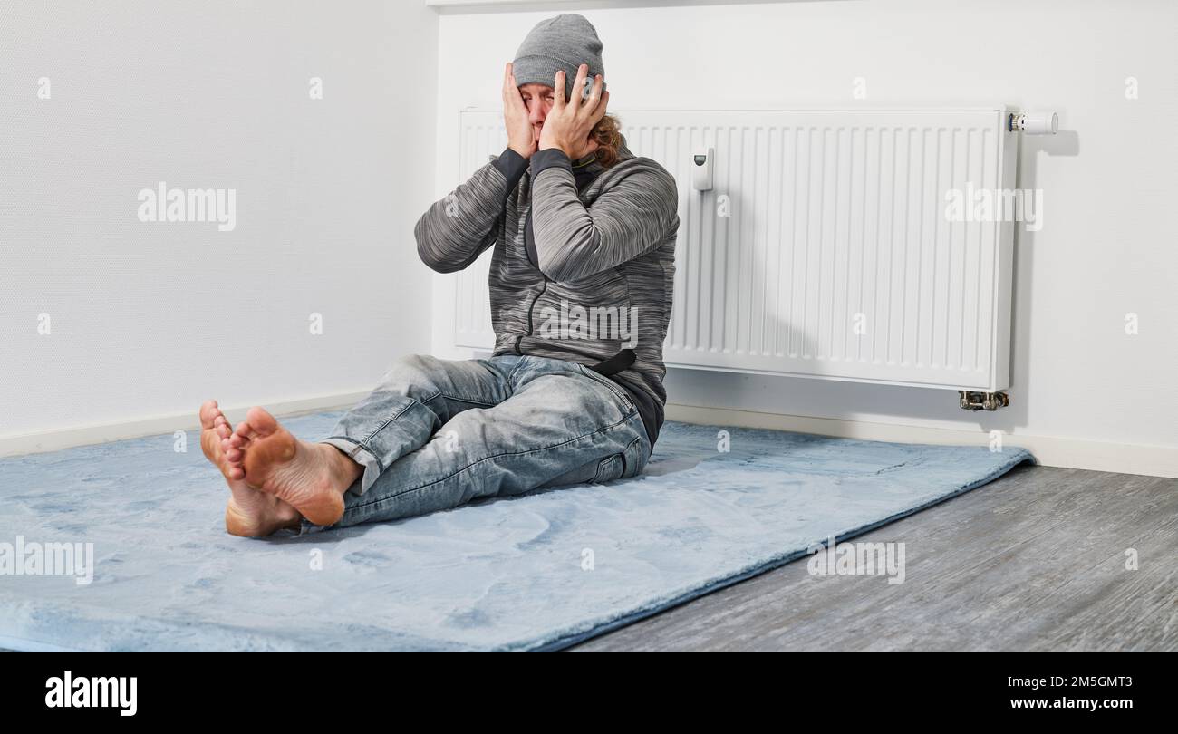 Freezing cold at home man hi-res stock photography and images - Alamy