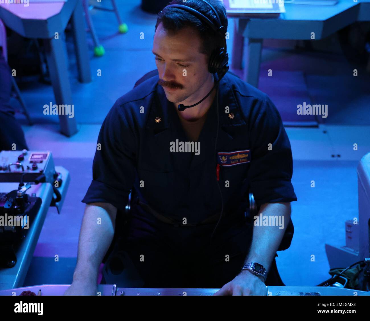 220318-N-CX281-1001 PHILIPPINE SEA (Mar. 17, 2022) Lt. Commander Alex ...