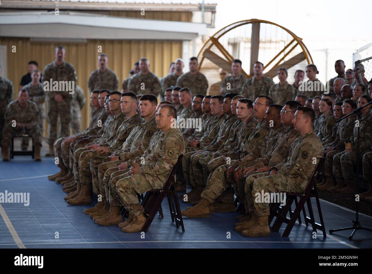 Members of the 404th Maneuver Enhancement Brigade listen to Maj. Gen ...