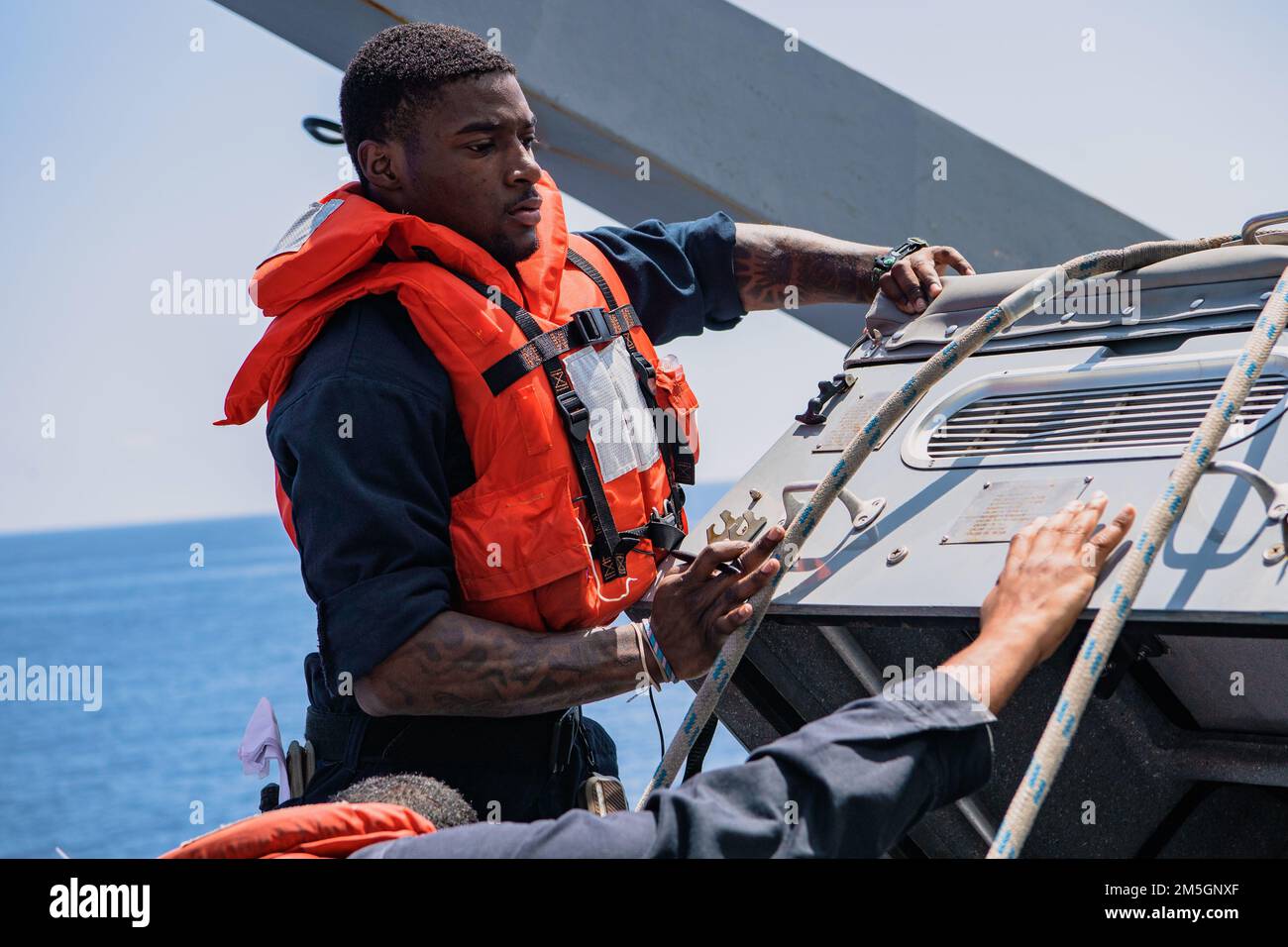 220318-N-TT059-2140 SOUTH CHINA SEA (Mar. 18, 2022) Damage Controlman ...