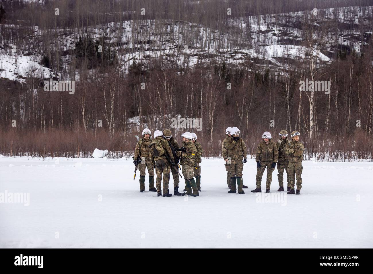 United Kingdom Royal Marine Commandos meet at a rally point after ...