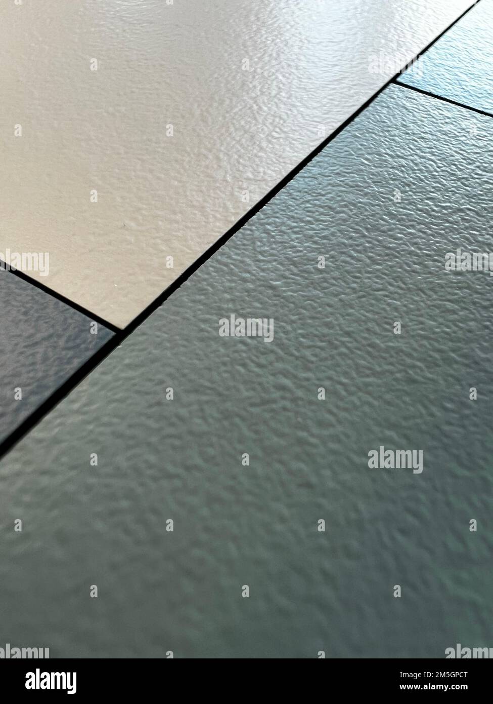 A vertical of facade plates template in geometrical shapes in blue and ...