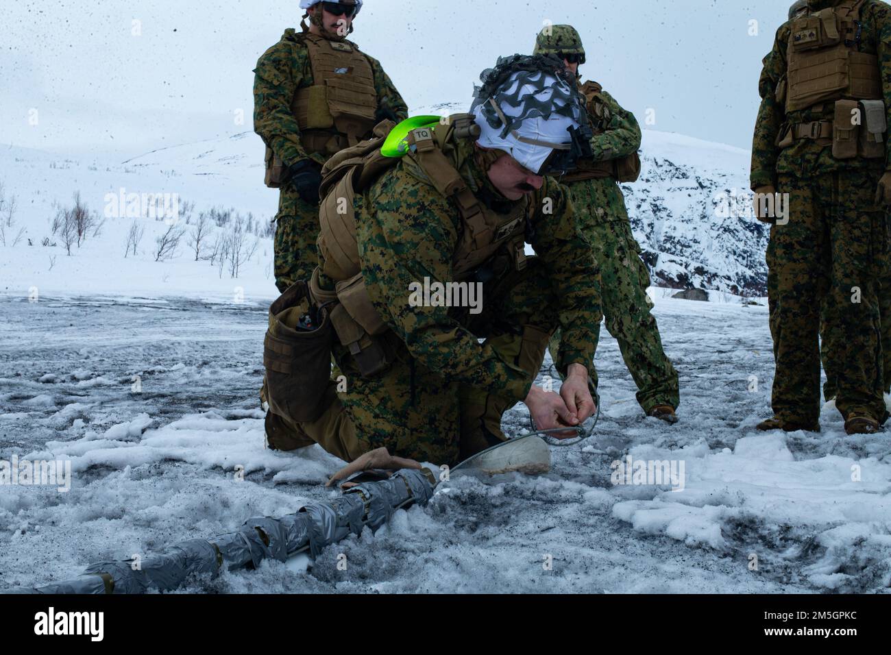 U.S. Marine Corps Sgt. Hall Justin performs an arctic demolition ...