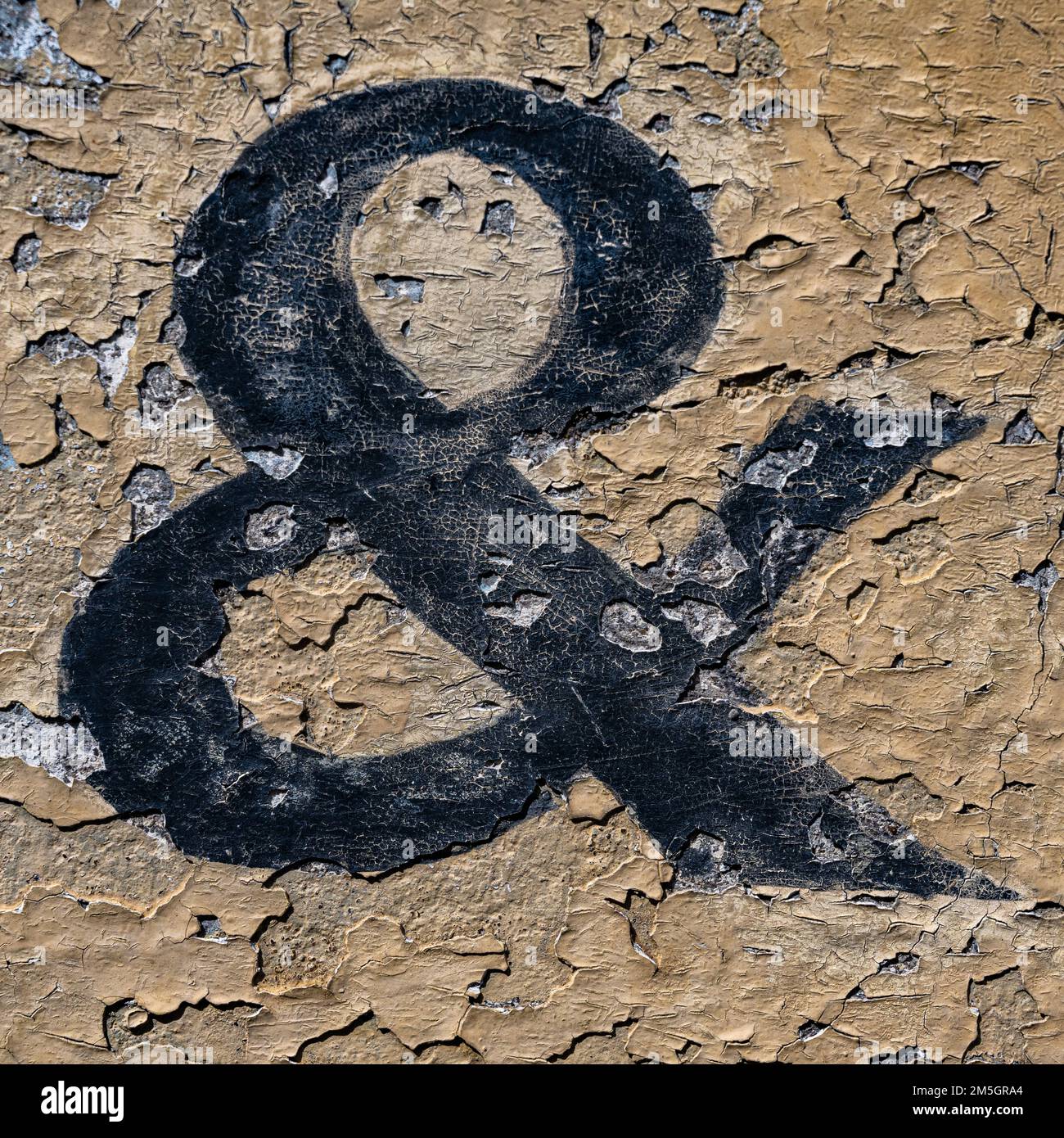 Ampersand sign on a peeling painted panel Stock Photo - Alamy