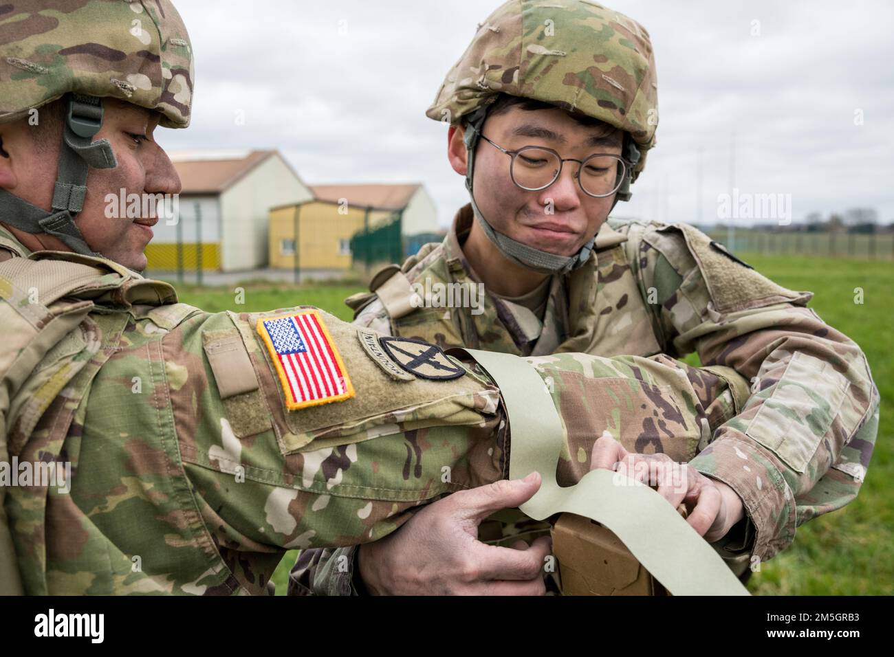U.S. Army Spc. Sewon Park, information technology specialist, applies ...