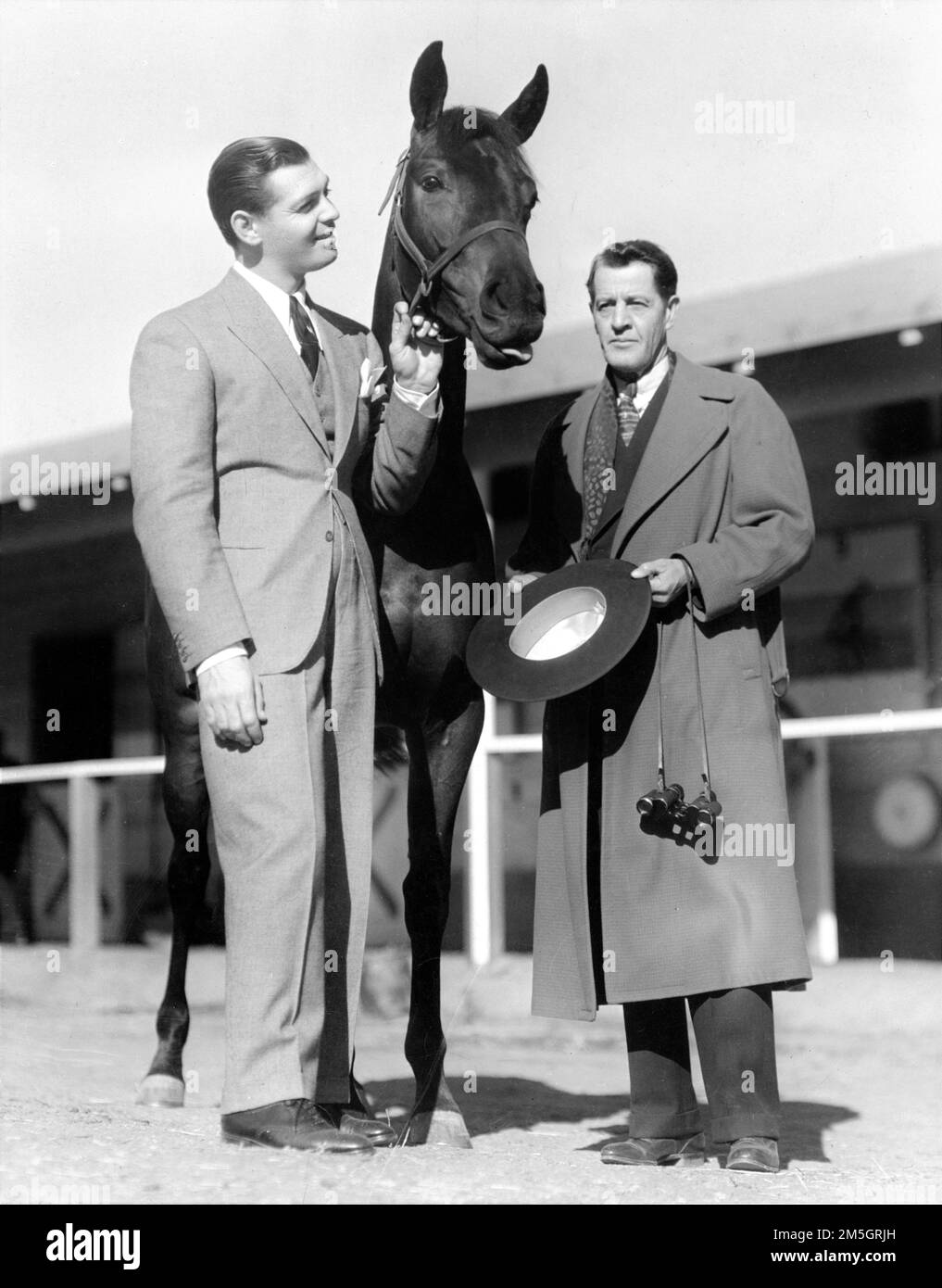 CLARK GABLE with his horse BEVERLY HILLS and an unidentified man at the ...