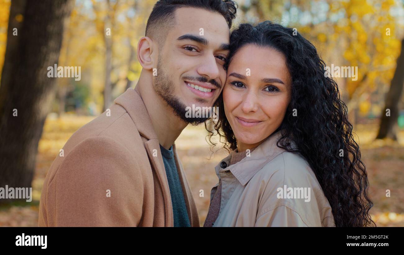 Close-up portrait outdoors Hispanic ethnic multiracial couple in love ...