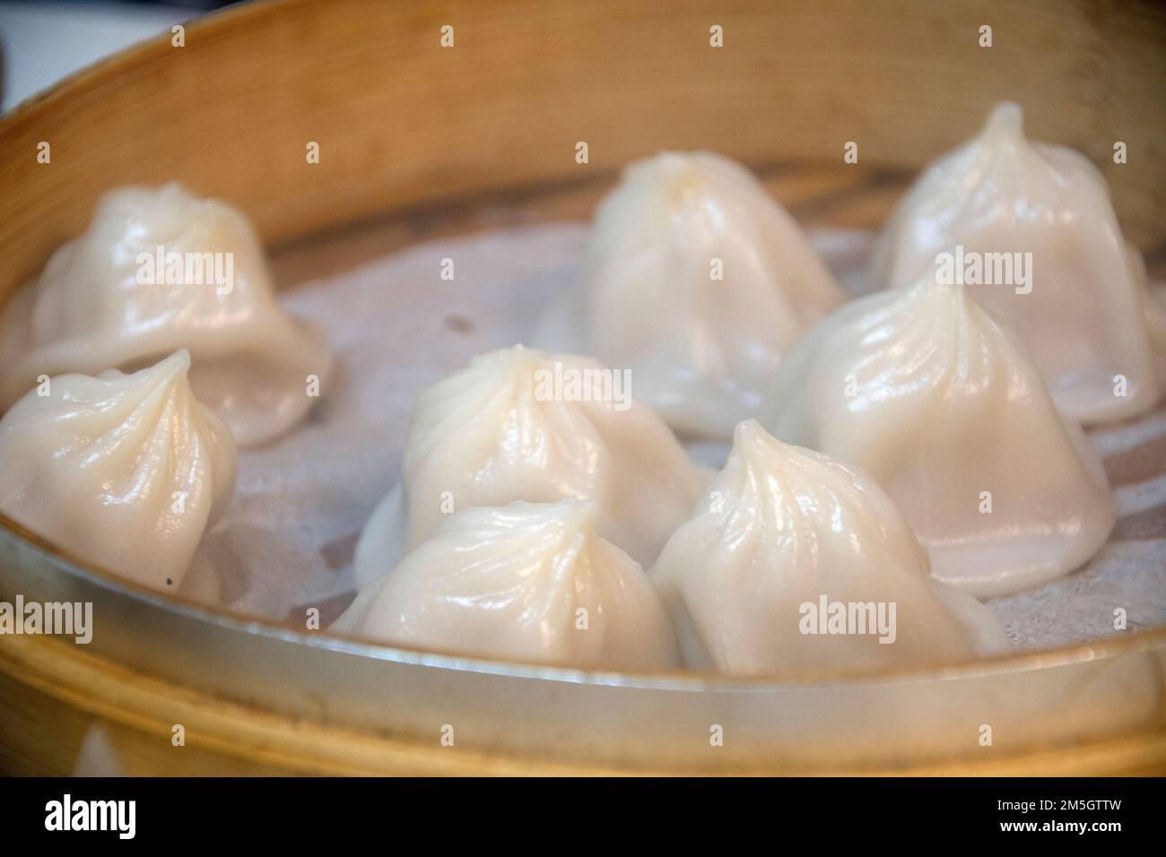 Steamed pork soup dumplings named Xiao long bao in Taiwan, Taiwanese ...