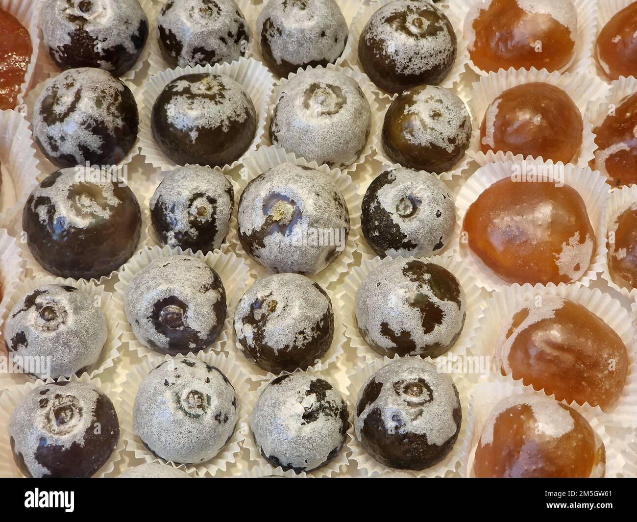 fresh glazed fruit sweet on display in pastry shop detail Stock Photo ...
