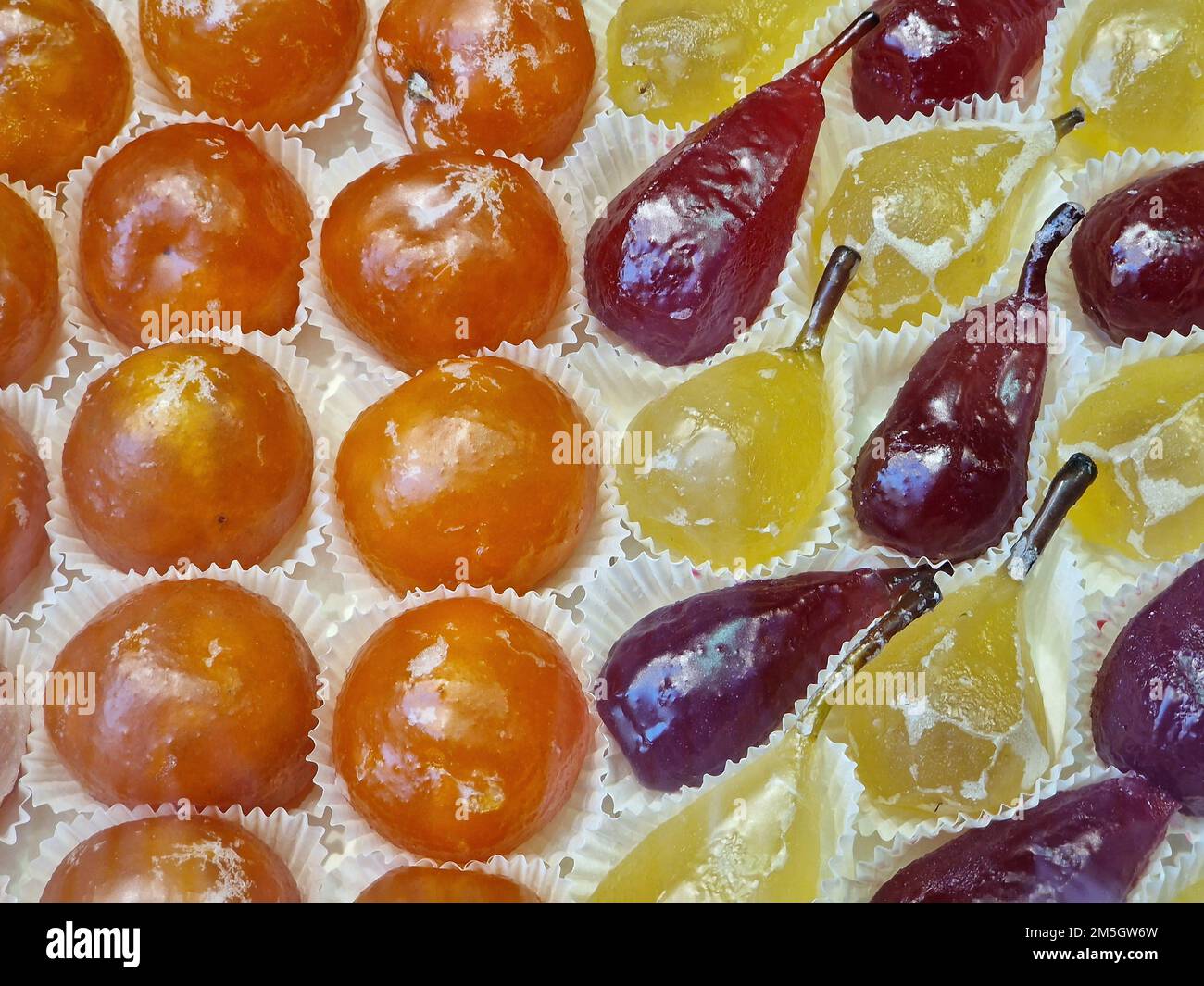 fresh glazed fruit sweet on display in pastry shop detail Stock Photo ...