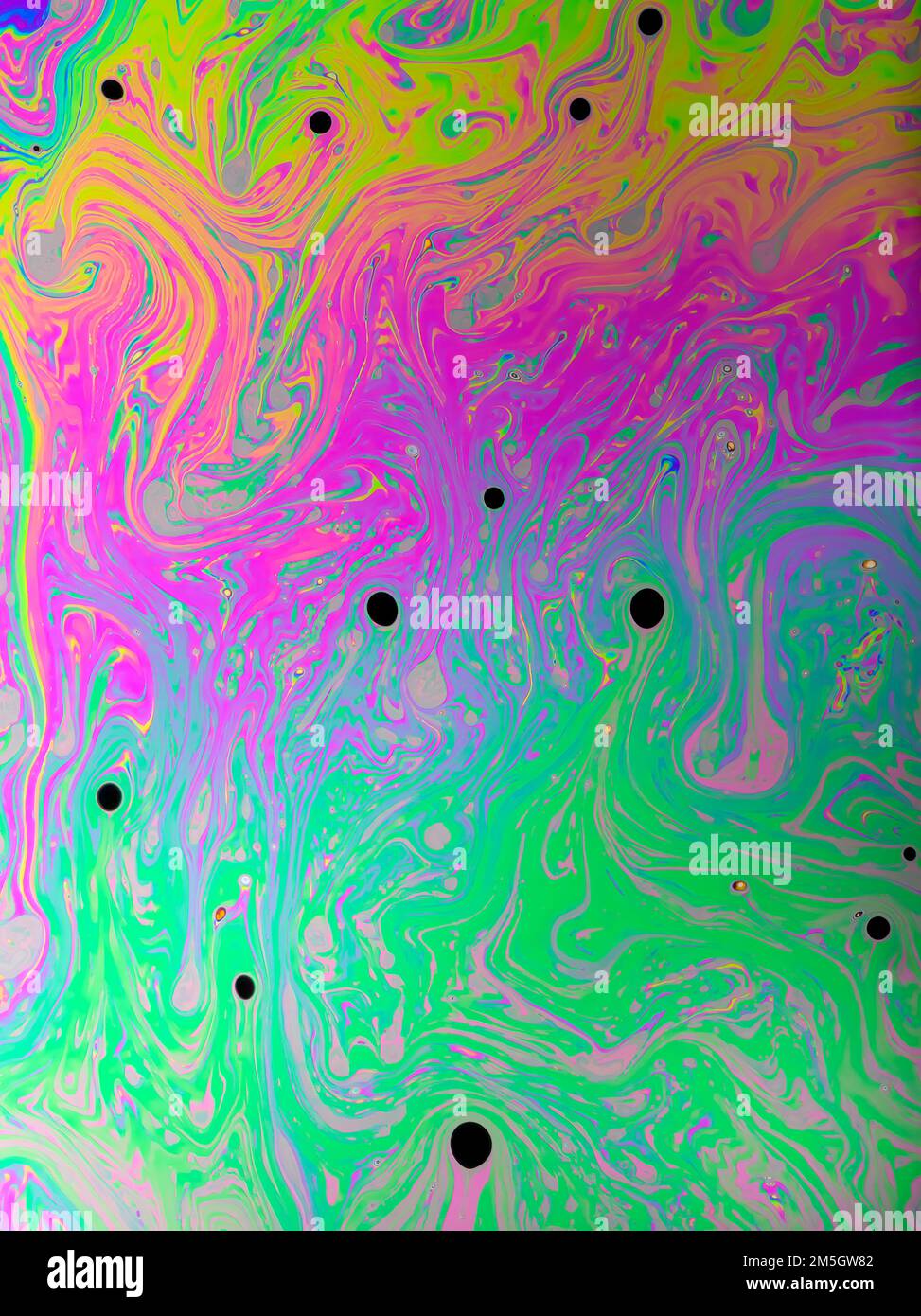 Colourful Light Diffraction Patterns Formed By Oil Droplets Floating On