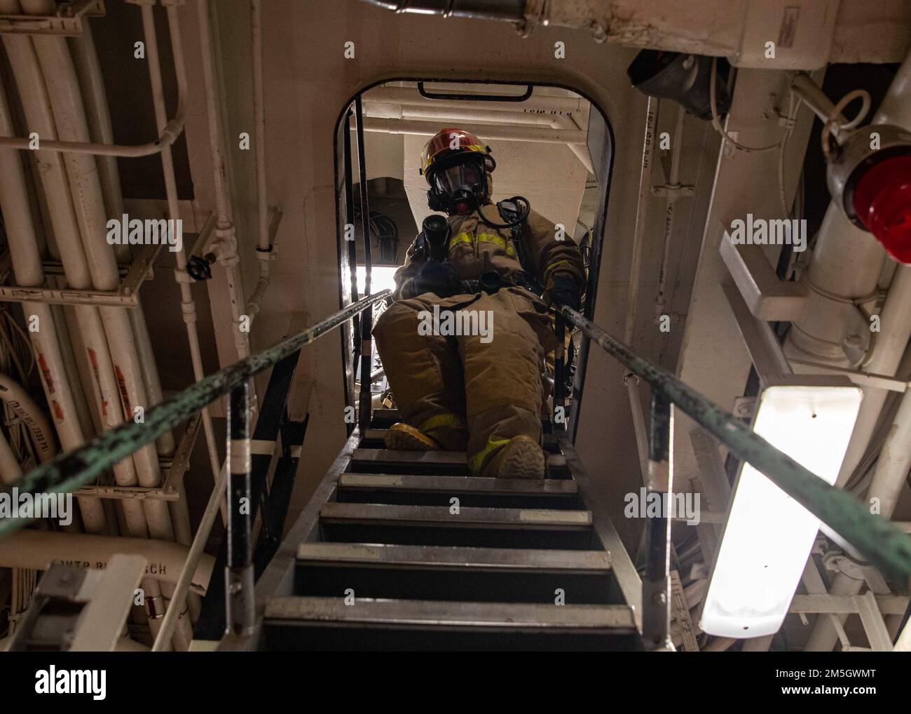220317-N-IV962-3116 PACIFIC OCEAN (March 17, 2022) – Damage Controlman ...