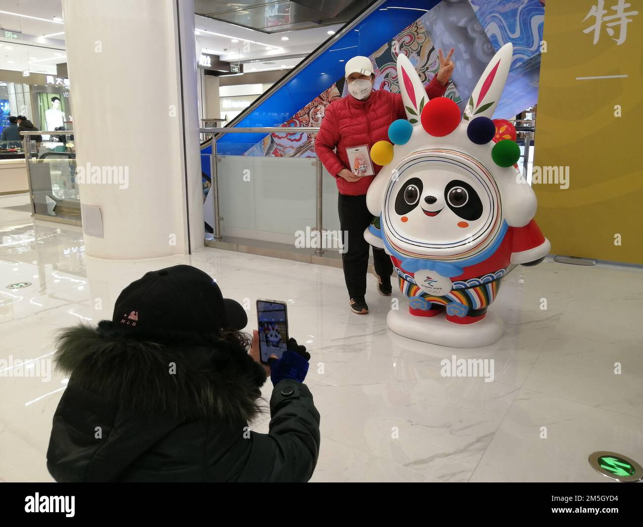 BEIJING, CHINA - DECEMBER 29, 2022 - Citizens pose for a photo with ...