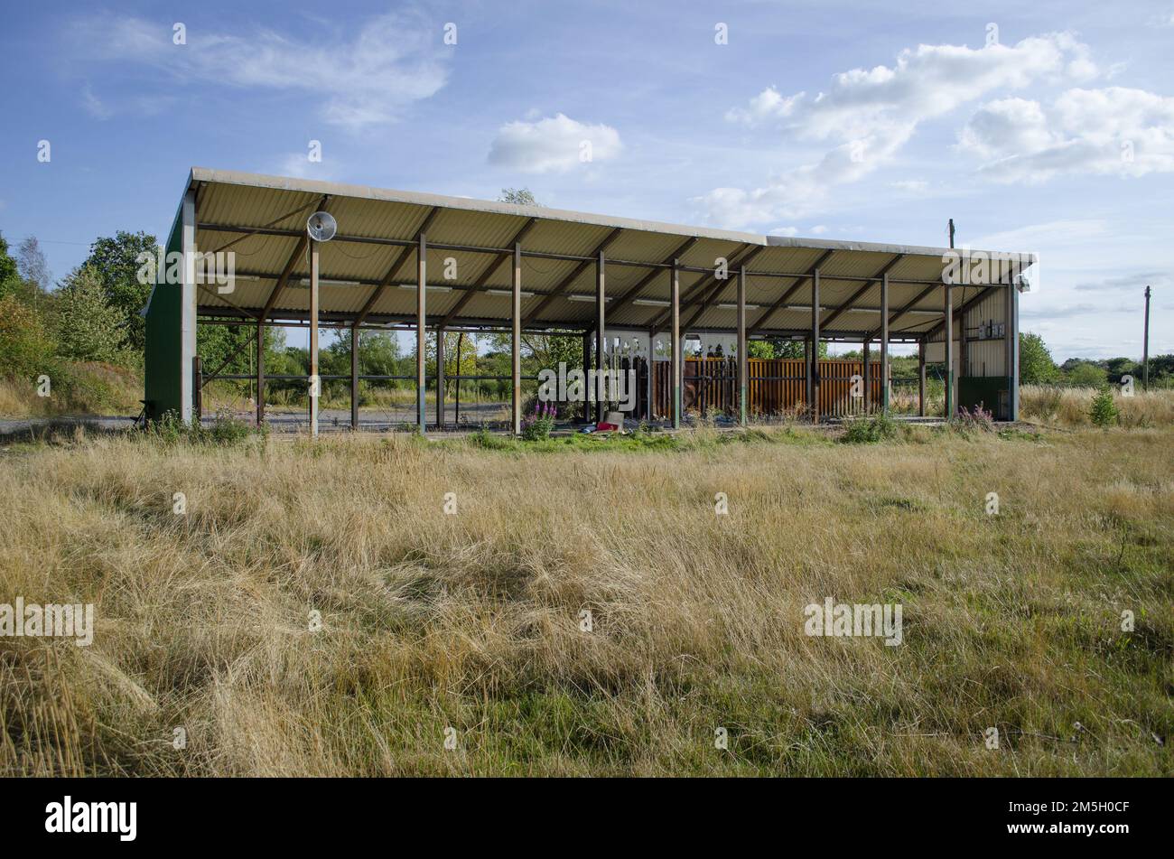 Derelict pavilion on disused sports ground Stock Photo - Alamy