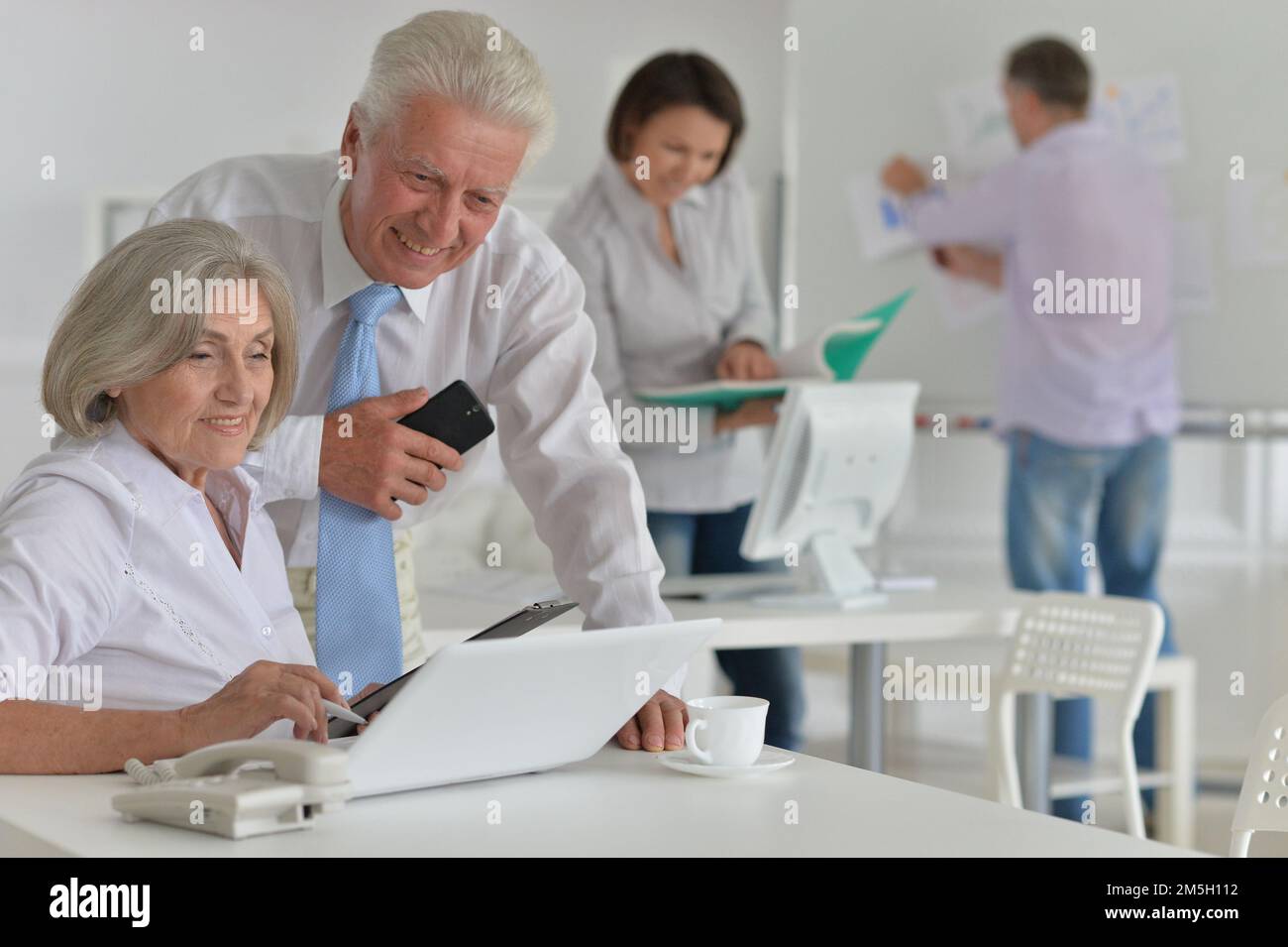 different generations work in the family business Stock Photo - Alamy