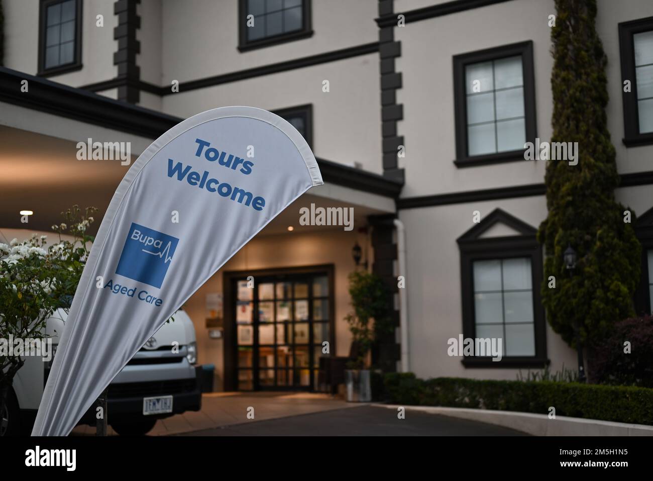 Tours welcome sign outside Bupa Aged Care Caulfield, with the main ...