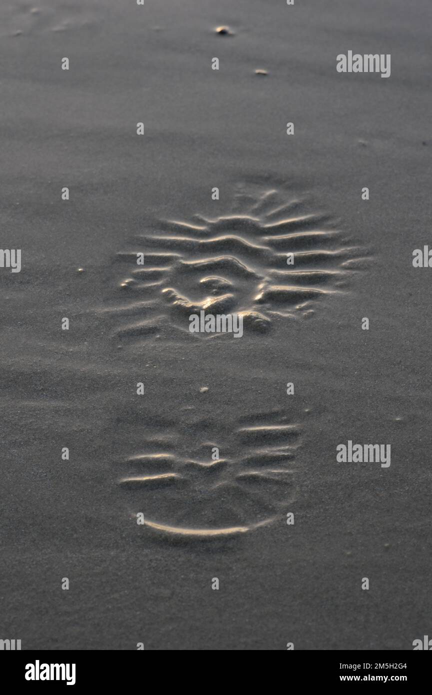 Footprint on sand Stock Photo - Alamy