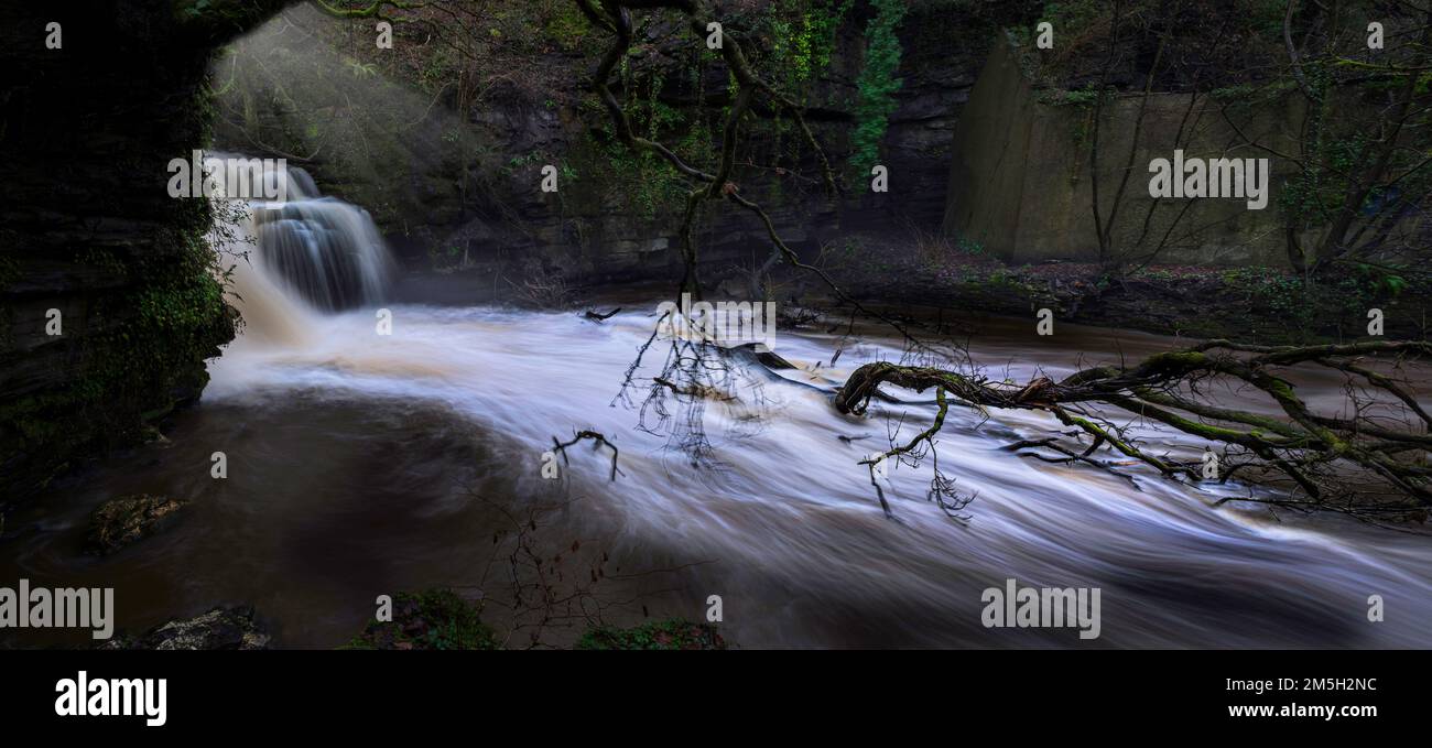 A man made industrial waterfalls near Neath Abbey on the river Clydach ...