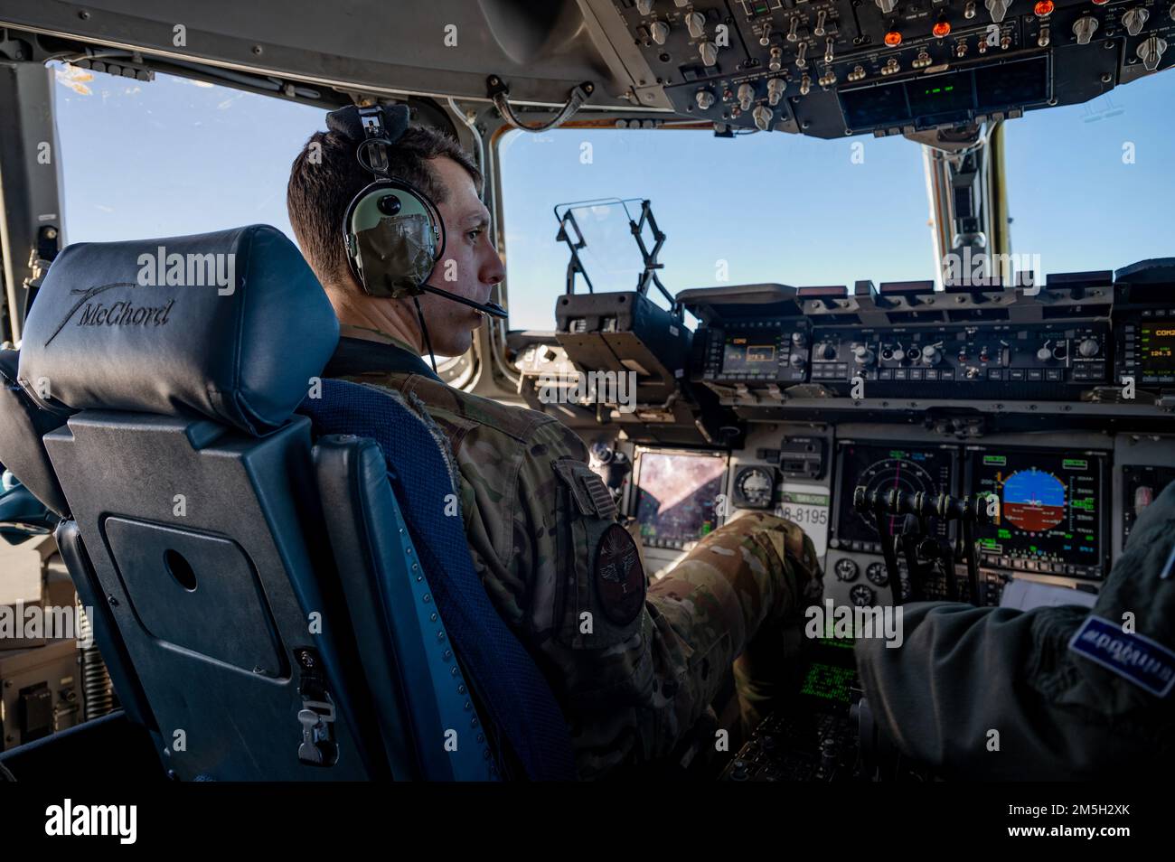 U.S. Air Force Capt. Chris Rolon, 8th Airlift Squadron pilot, flies a C ...