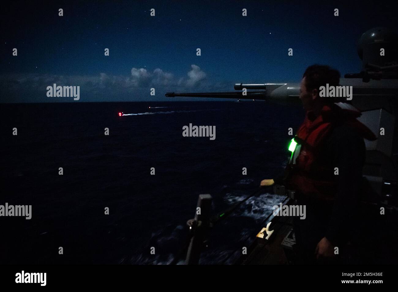 PHILIPPINE SEA (March 17, 2022) Gunner’s Mate 3rd Class Sam Wolff, from ...