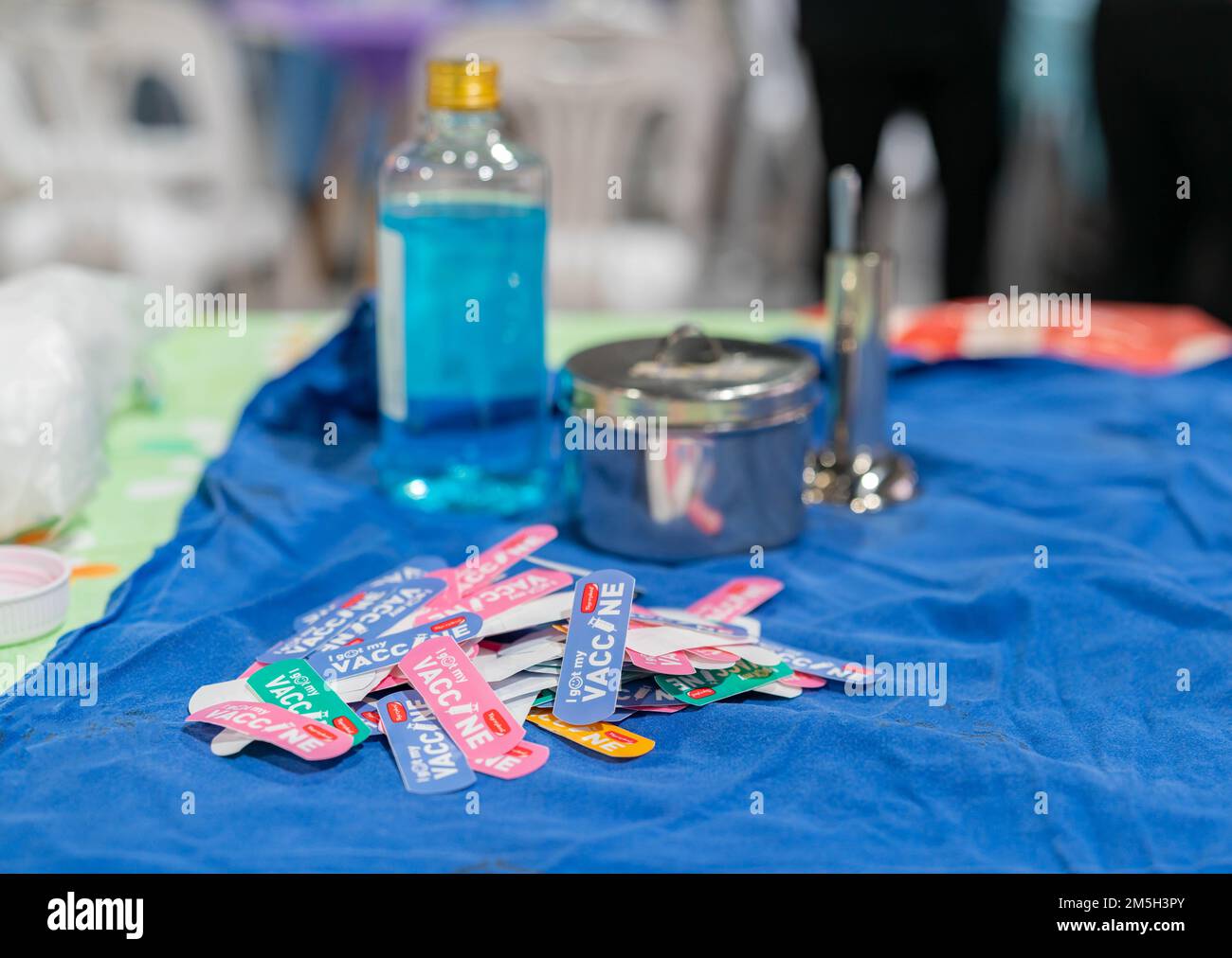 Vaccinated sticker or Vaccination round badges on blue cloth ...