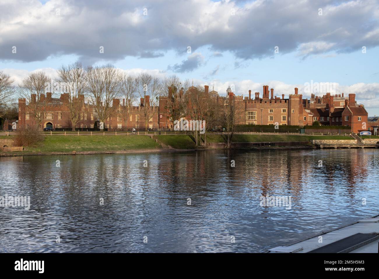 Hampton Court Palace Tudor exterior on to the River Thames in spring ...