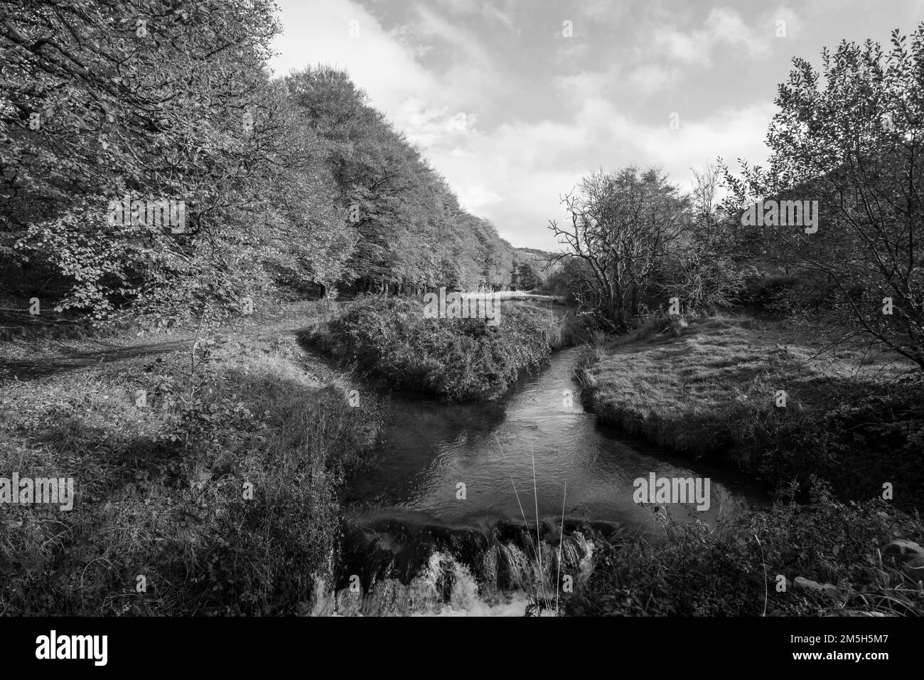 The Weir Water river flowing under Robbers Bridge in Exmoor National ...