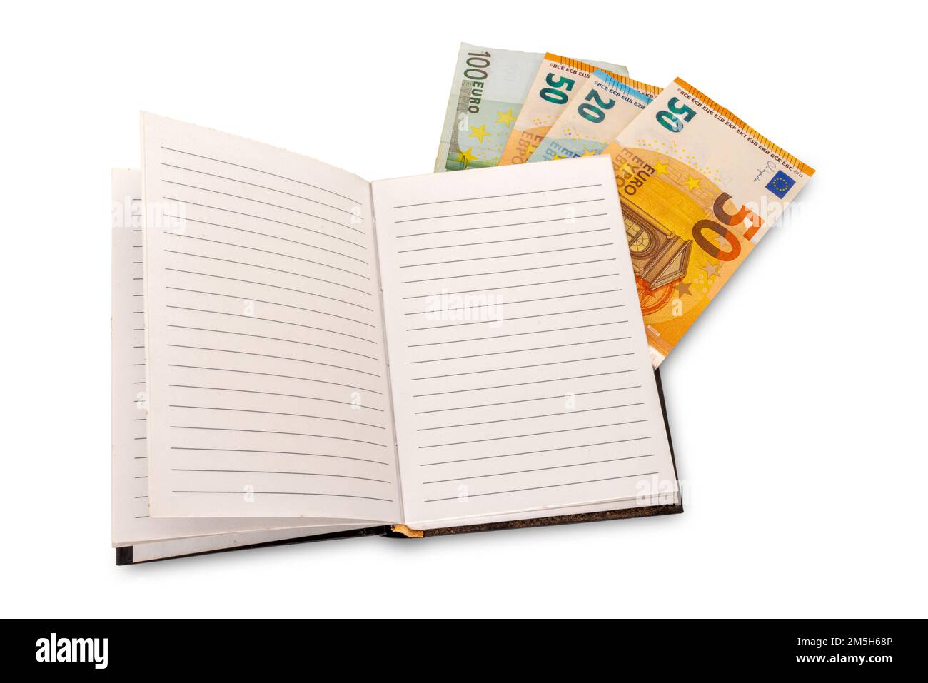 Open notebook with lined paper with euro banknotes between the pages ...
