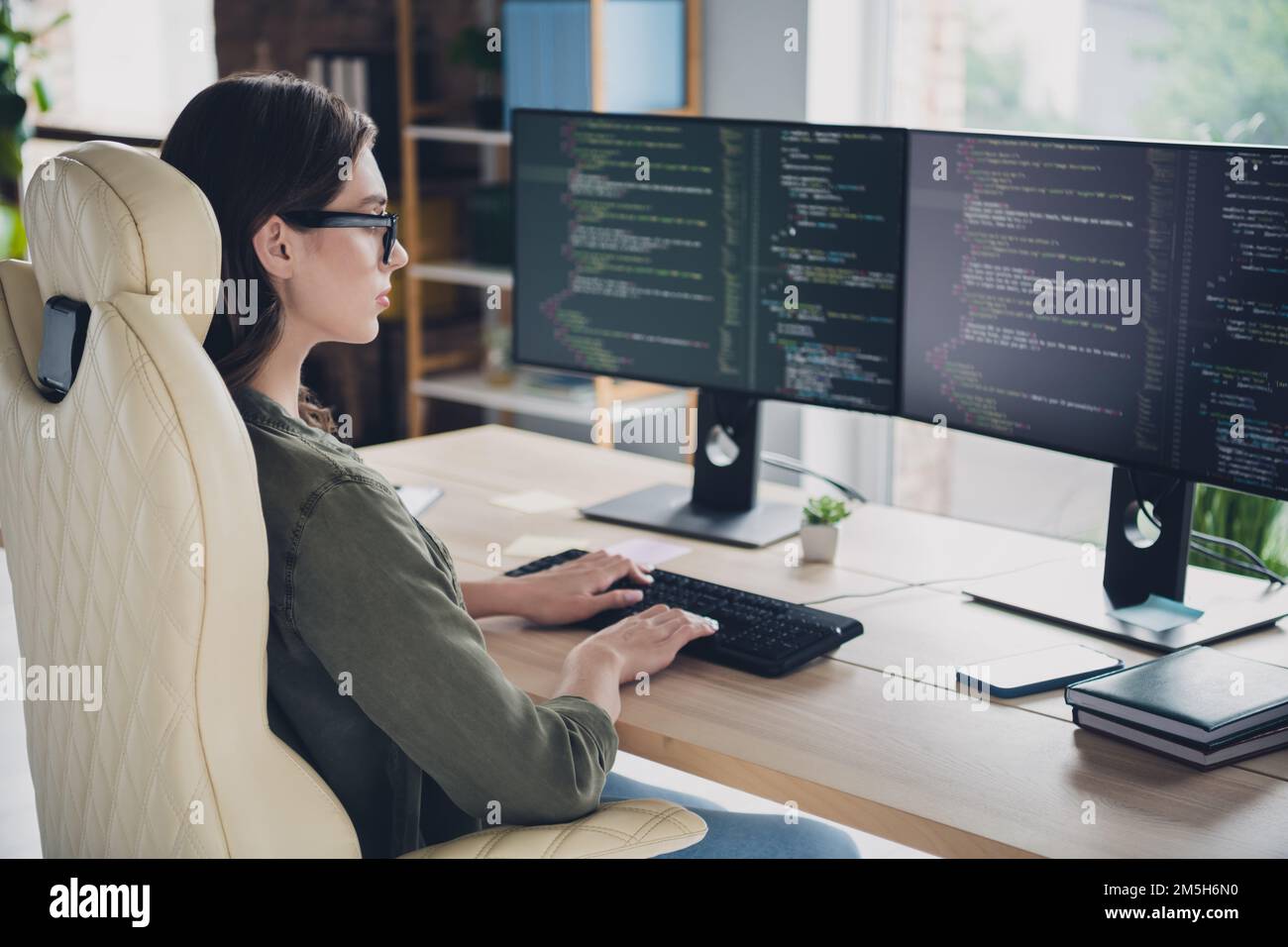 Photo of smart busy lady it professional wear spectacles coding new ...