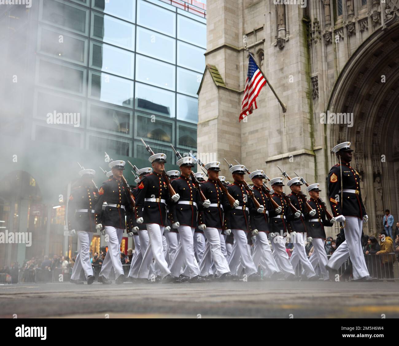 U.S. Marines with the Marine Corps Silent Drill Platoon march along ...