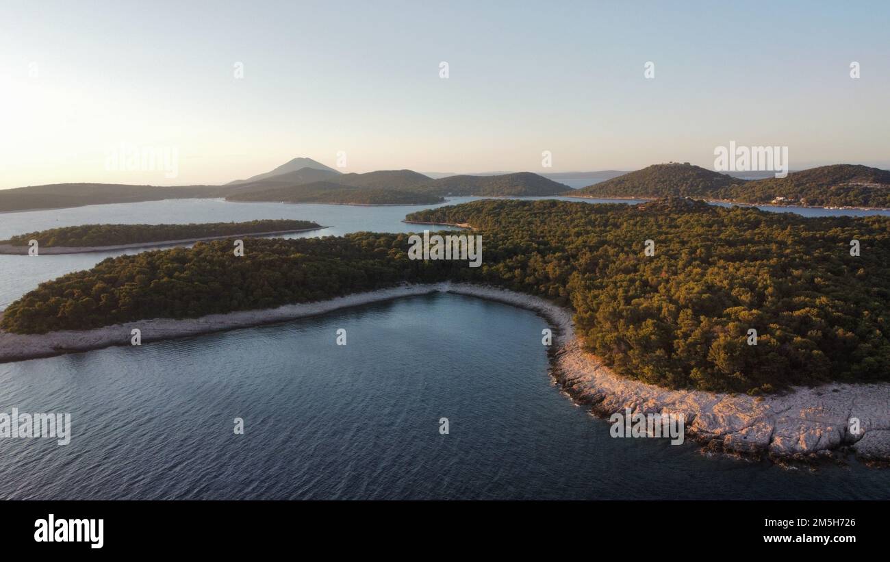 An aerial view of the scenic shore of Croatia under a sunset sky Stock ...