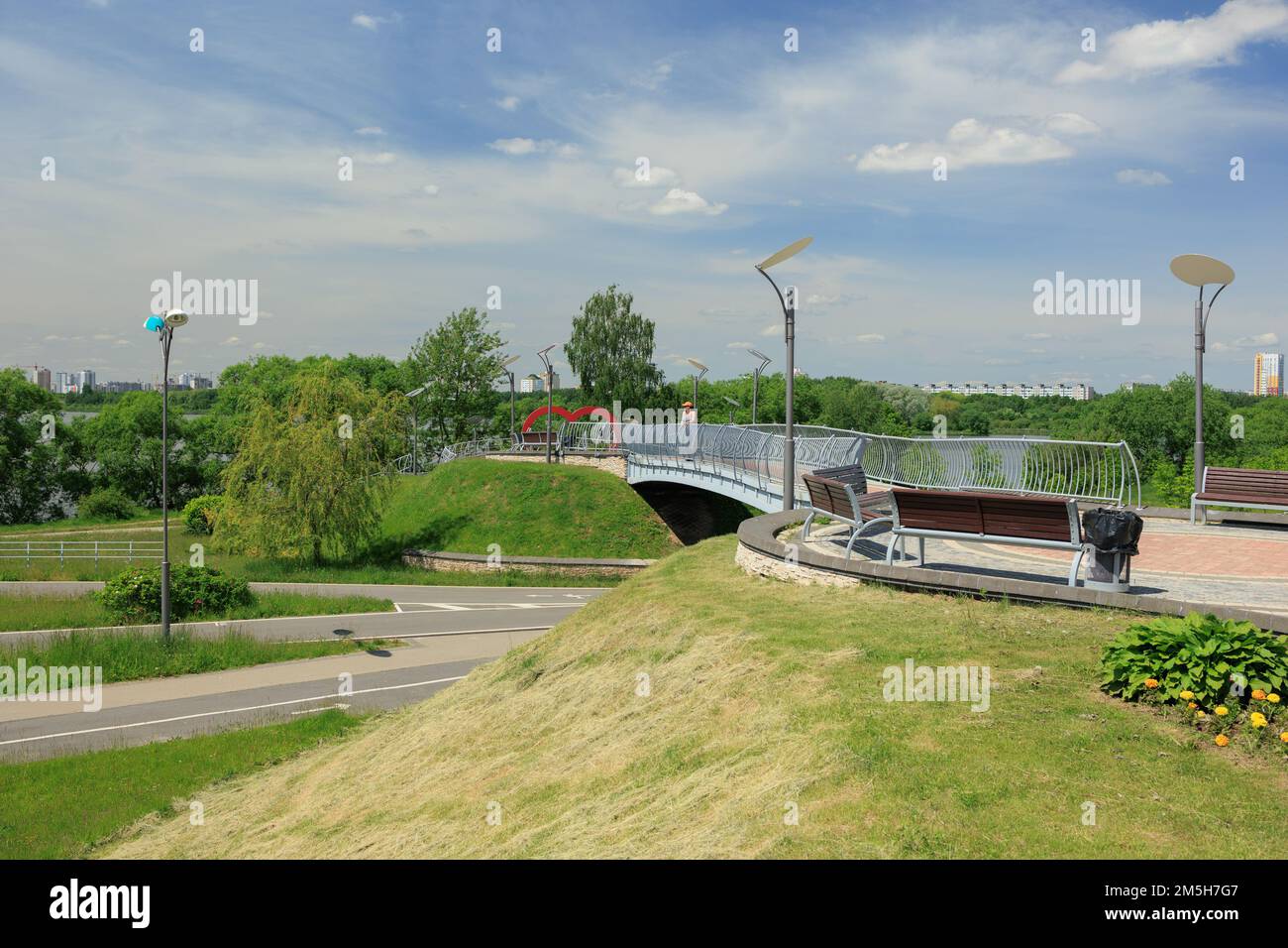 Bridge, roadside and asphalt, blue sky in the city streets in public ...