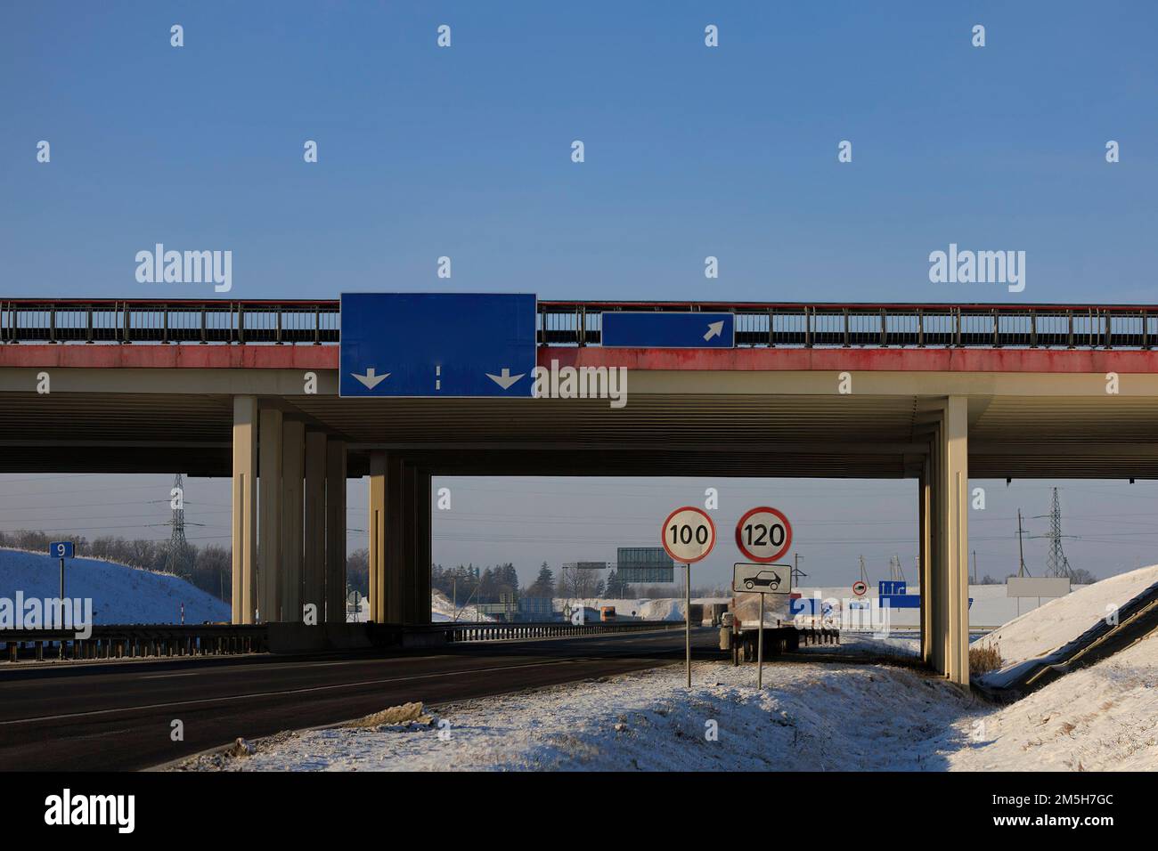 Bridge, roadside and asphalt, blue sky in the city streets in public ...