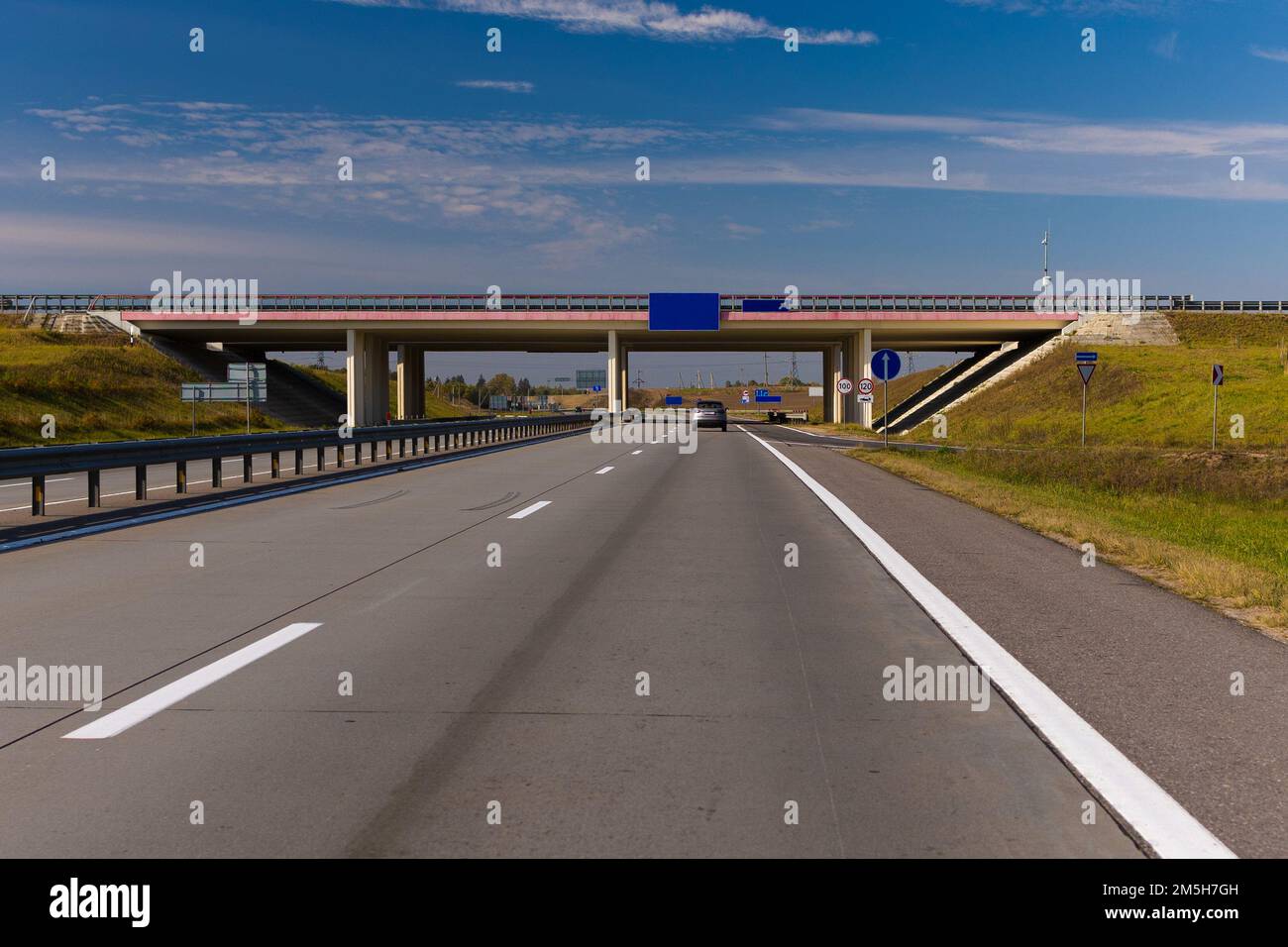 Bridge, roadside and asphalt, blue sky in the city streets in public ...