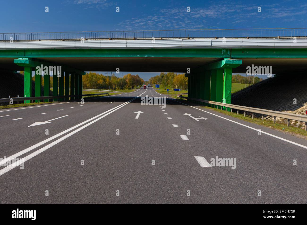 Bridge, roadside and asphalt, blue sky in the city streets in public ...