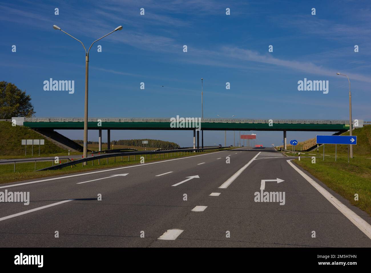 Bridge, roadside and asphalt, blue sky in the city streets in public ...