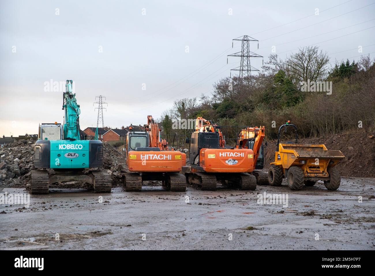 Construction machinery on a building site on the Ballygomartin Road in ...